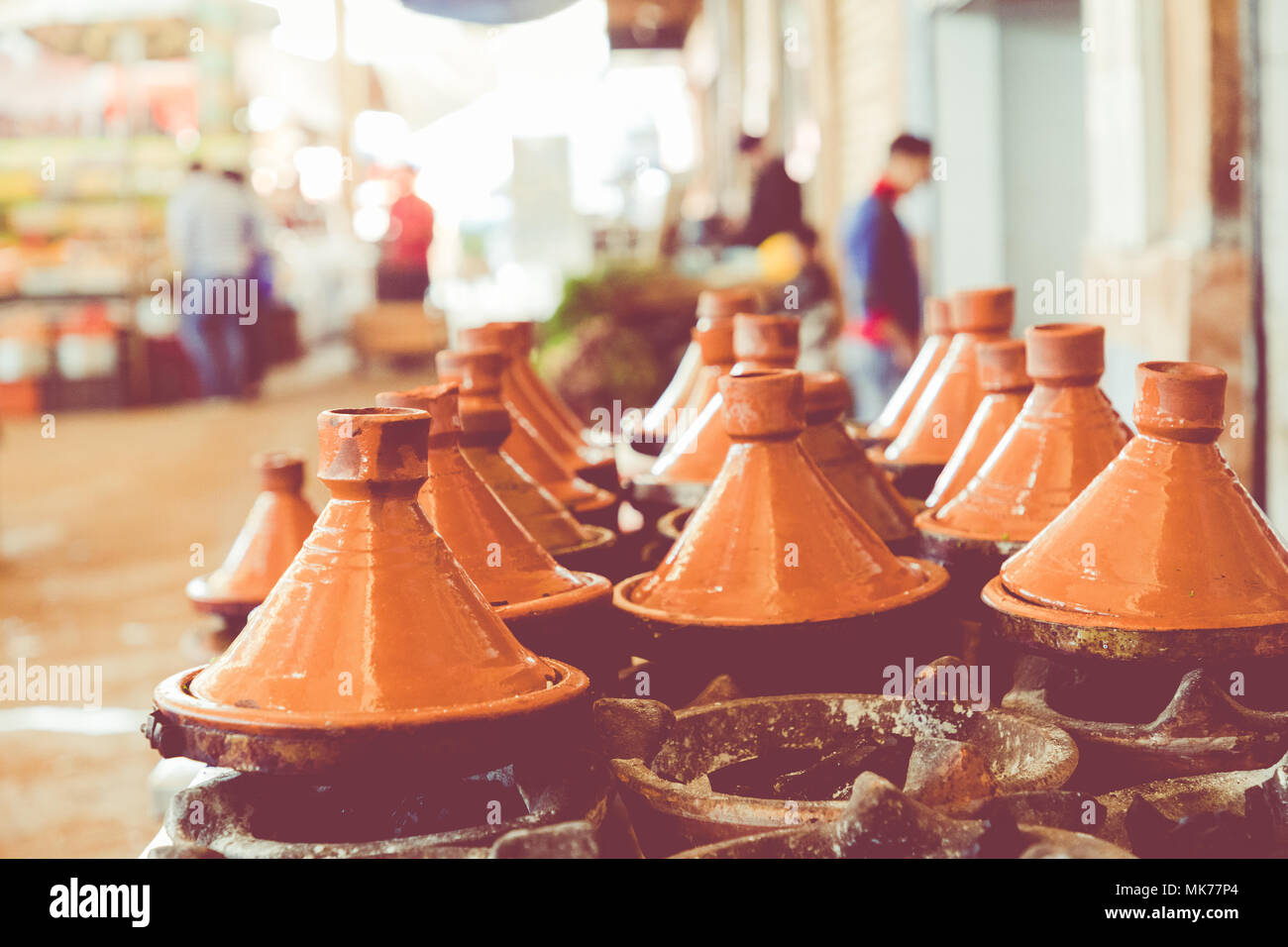 Preparing food in tajin traditional dish in Morocco - meat and ...