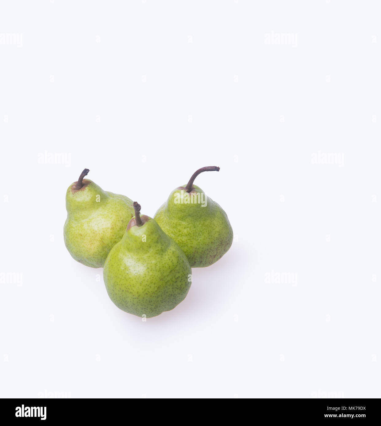pears or three pears on a background Stock Photo - Alamy