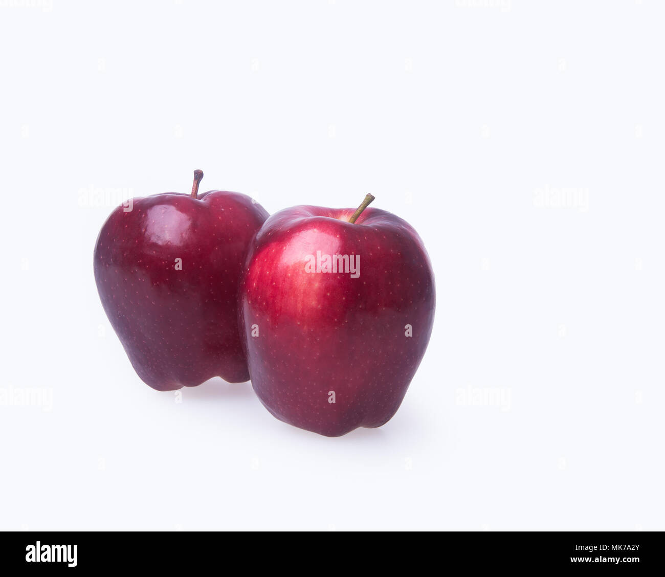 apple or two red apple on a background Stock Photo - Alamy