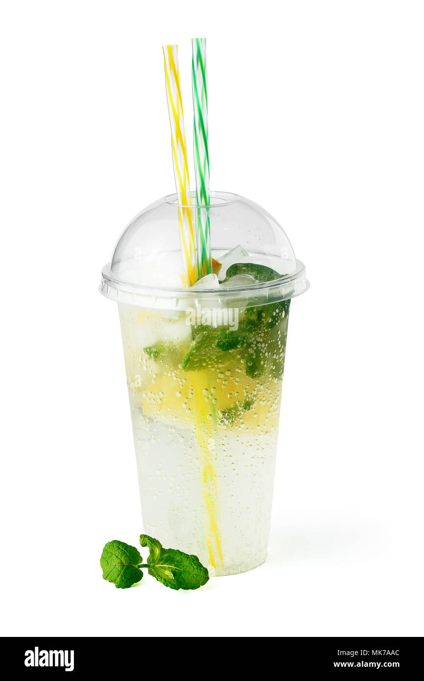 Cooling lemonade drink in plastic glass with lemon slices, mint and ...