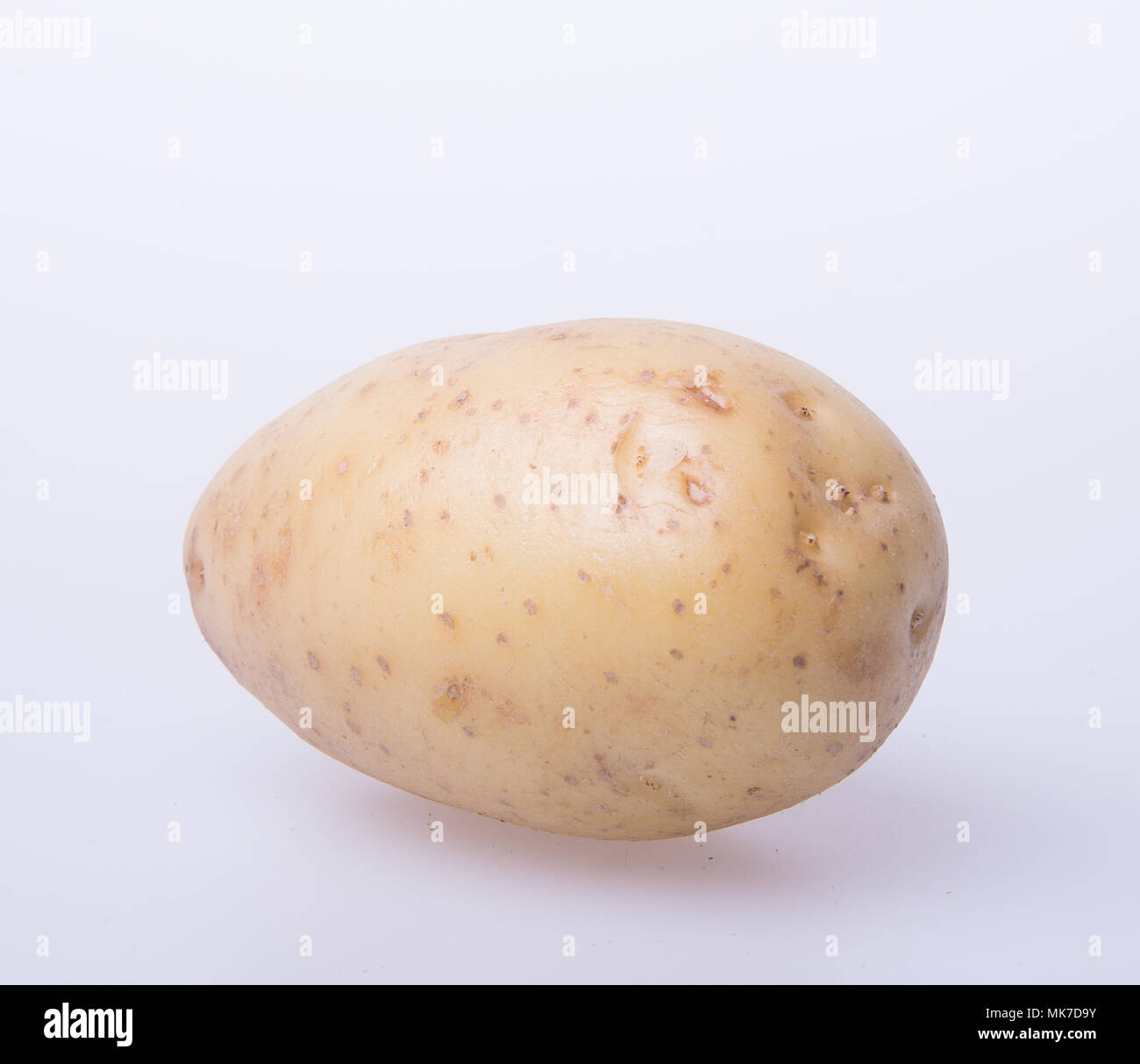 potato or organic potato on a background Stock Photo - Alamy