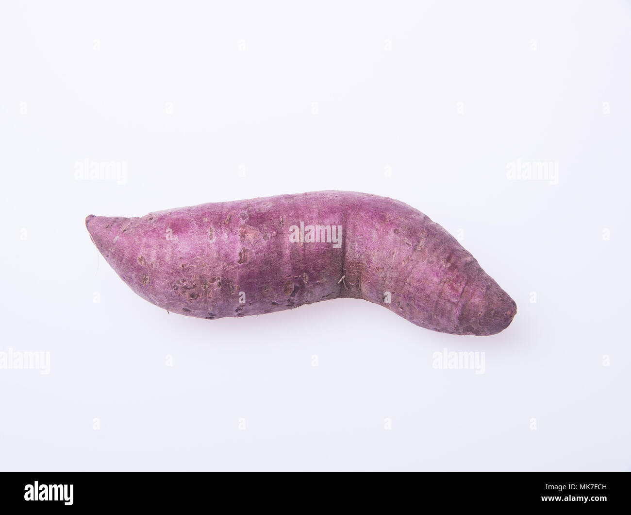 sweet potato or fresh purple yams on background Stock Photo - Alamy