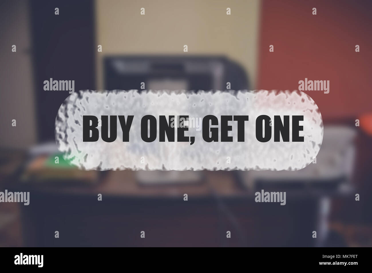 Buy one get one word with blurring business background Stock Photo - Alamy