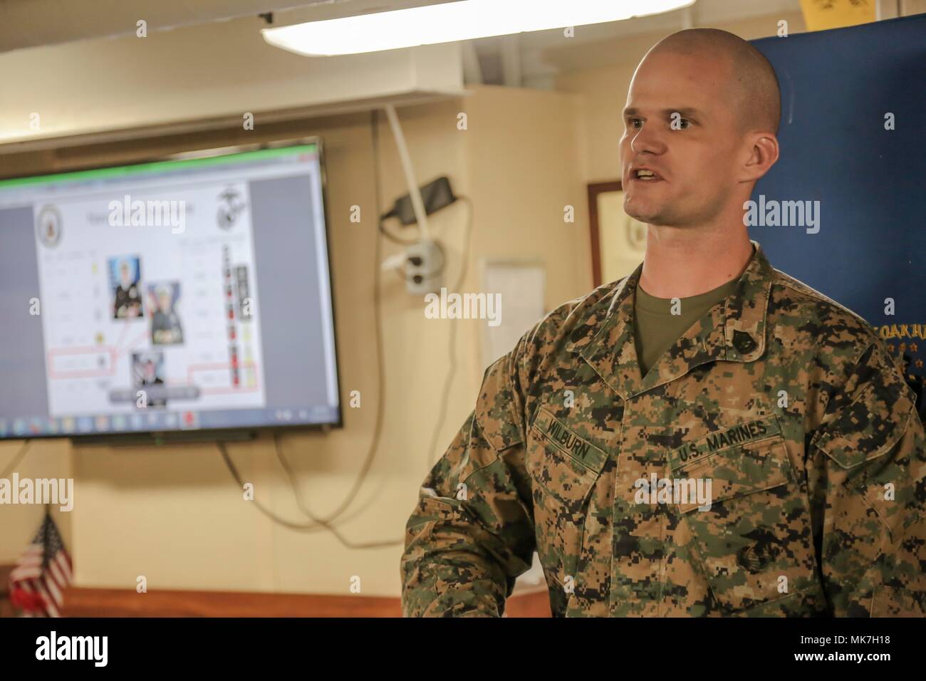 U.S.Marine Corps Gunnery Sgt. Jeffrey Wilburn, a Combat Cargo assistant ...