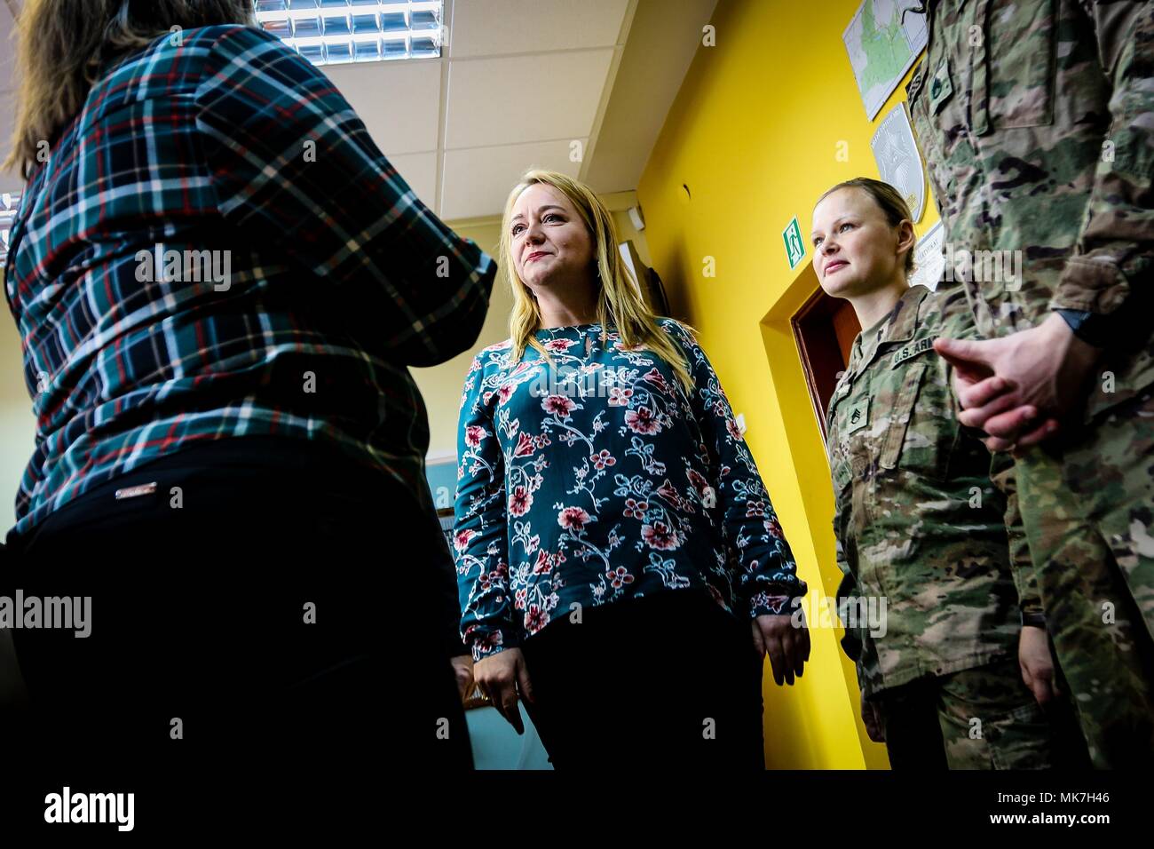 Staff Sgt. Anna Arnold (right, center), a Minneapolis, Minn. native and ...