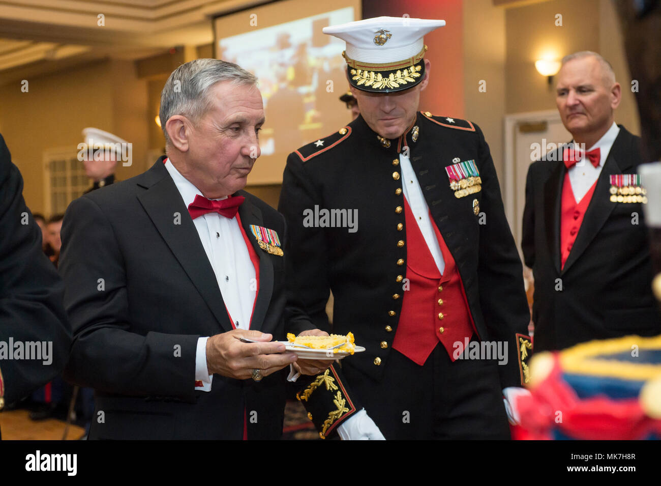 Retired U.S. Marine Corps Lt. Gen. George Flynn, left, guest of honor ...