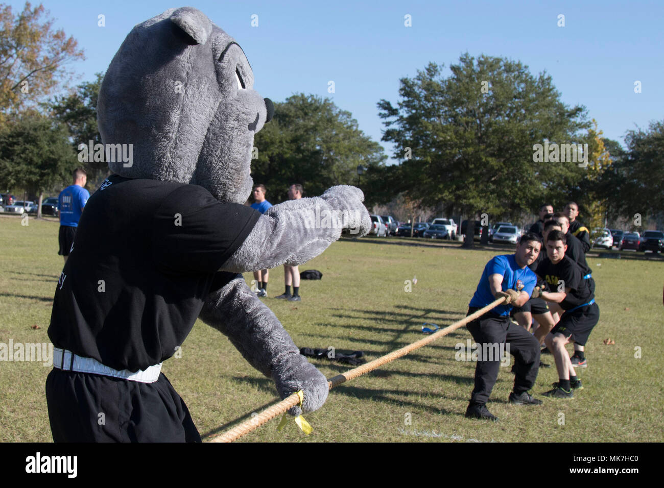 Sgt. Rocky, 3rd Infantry Division's mascot, holds the rope to ensure ...