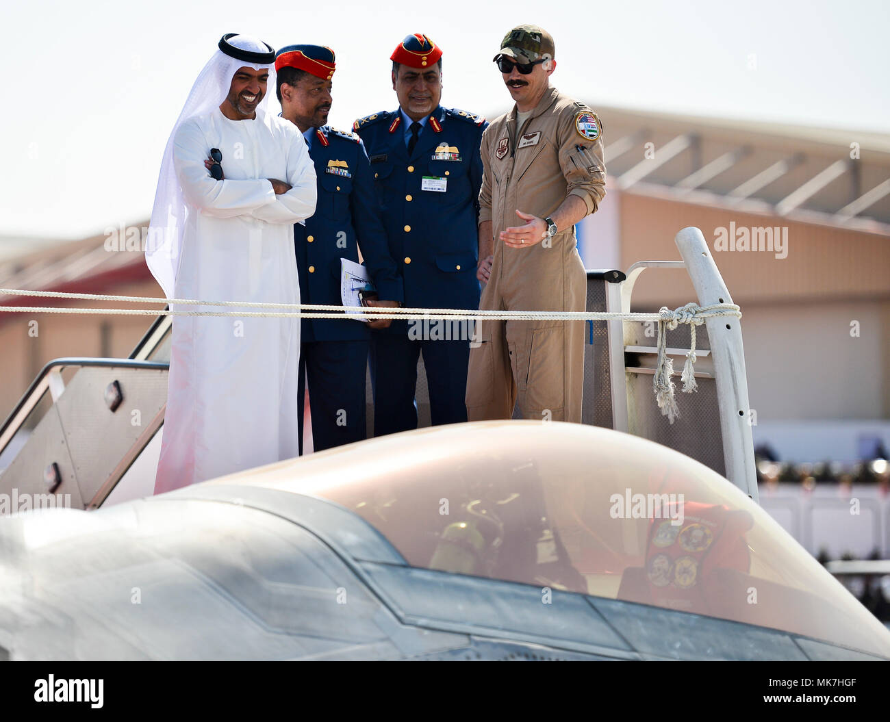 Distinguished Emirate guests are given an F-22 static display tour by ...