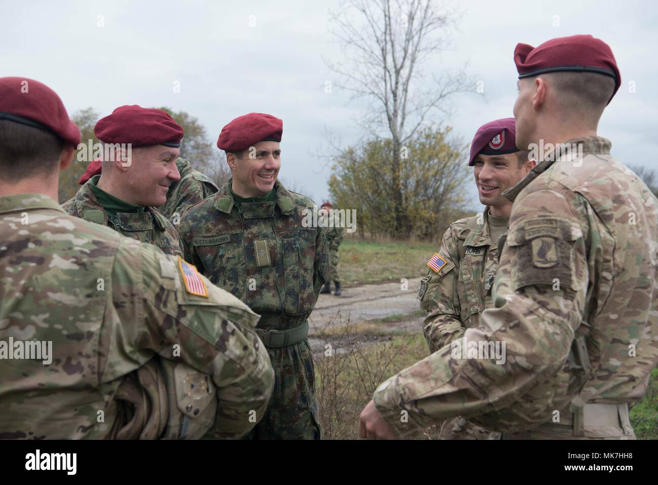 U.S. paratroopers and Serbian armed forces discuss their jump after ...