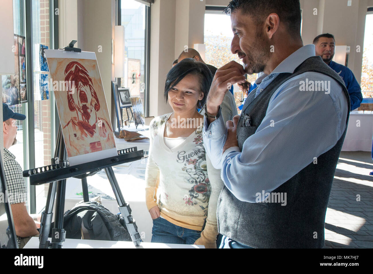 Air Force Staff Sgt. Natalie Lopez talks with Army veteran and former ...