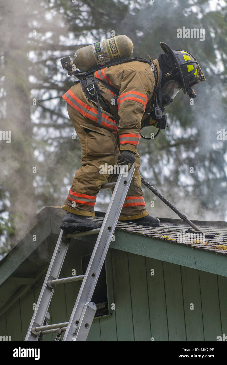 Firefighters Fighting Fires Stock Photo - Alamy
