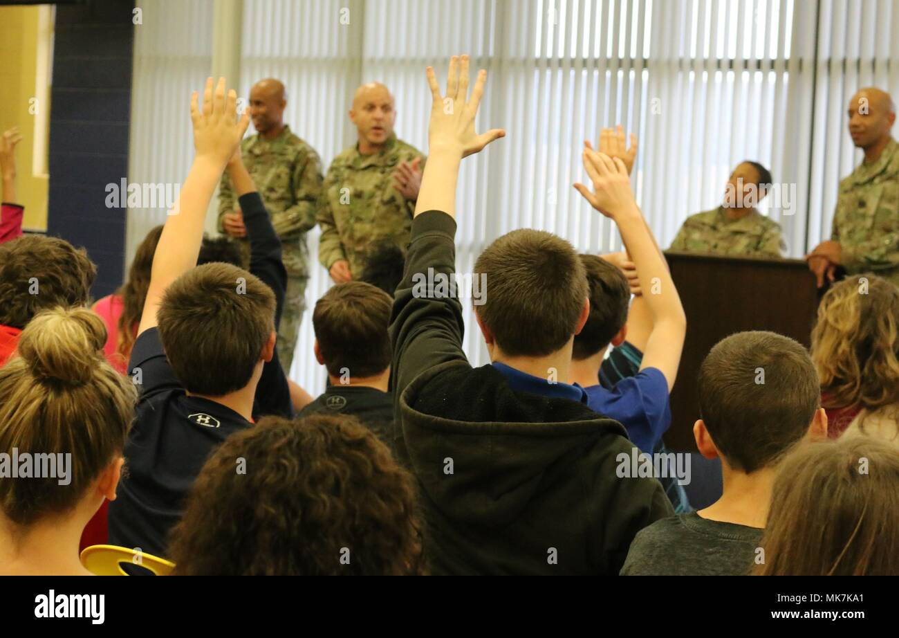 Buckhorn Middle School students raise their hands to ask questions ...
