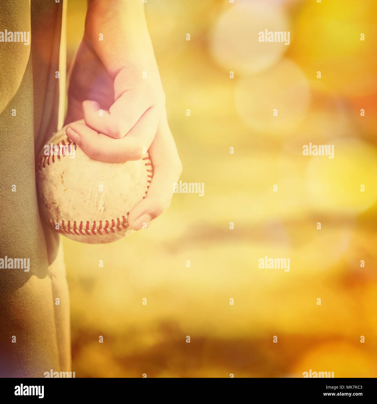 close up of a baseball in the pitchers hand Stock Photo - Alamy