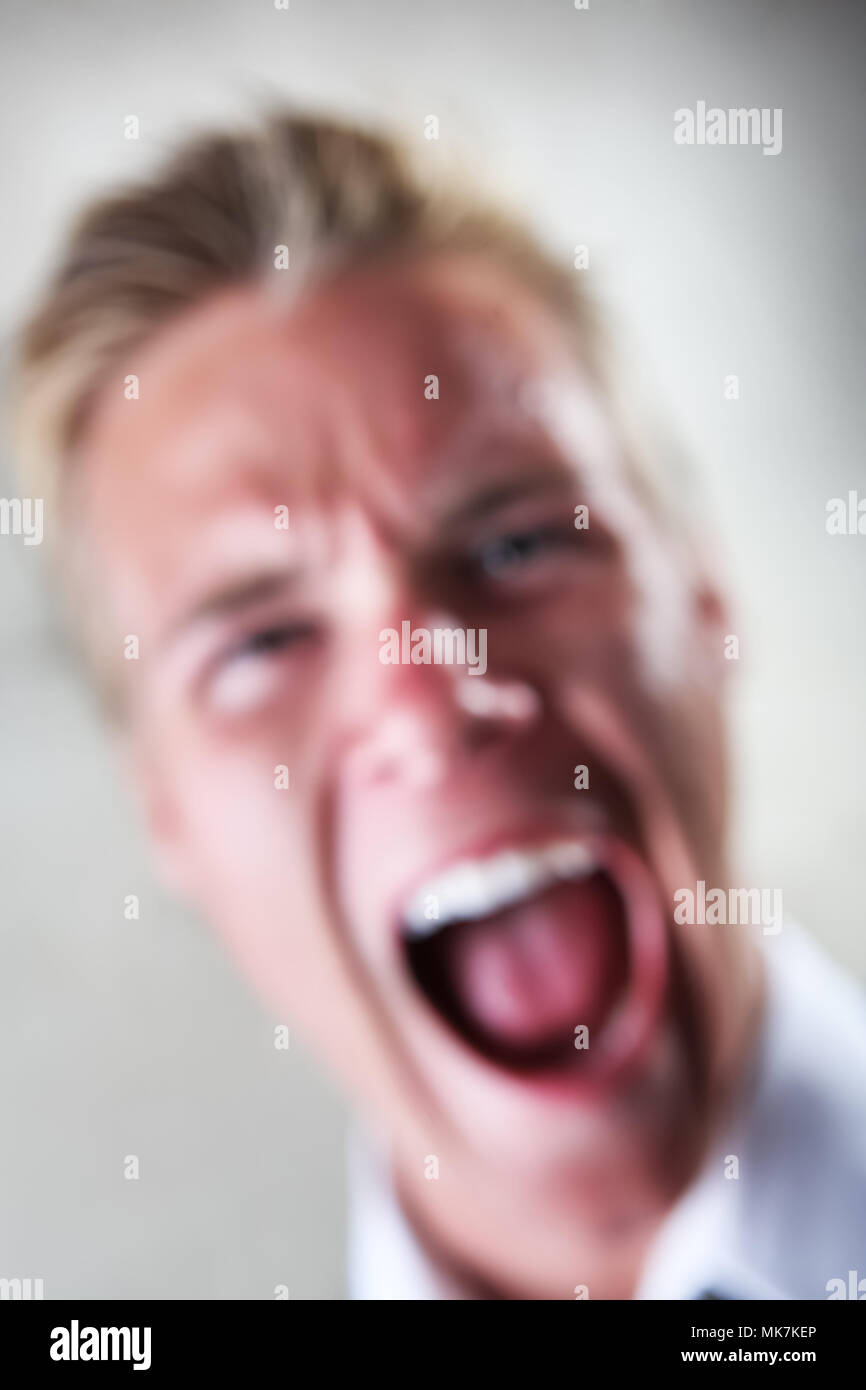 Teen boy screaming open mouth hi-res stock photography and images - Alamy