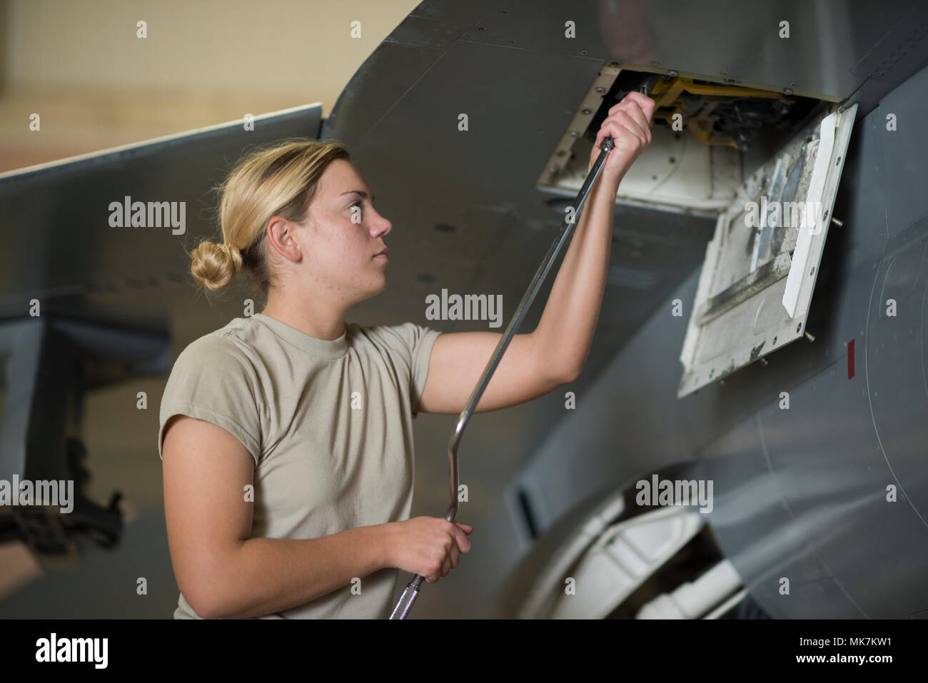 Airman 1st Class Erin Luke, a 363rd Training Squadron student, clears the gun on an F-16 in ...