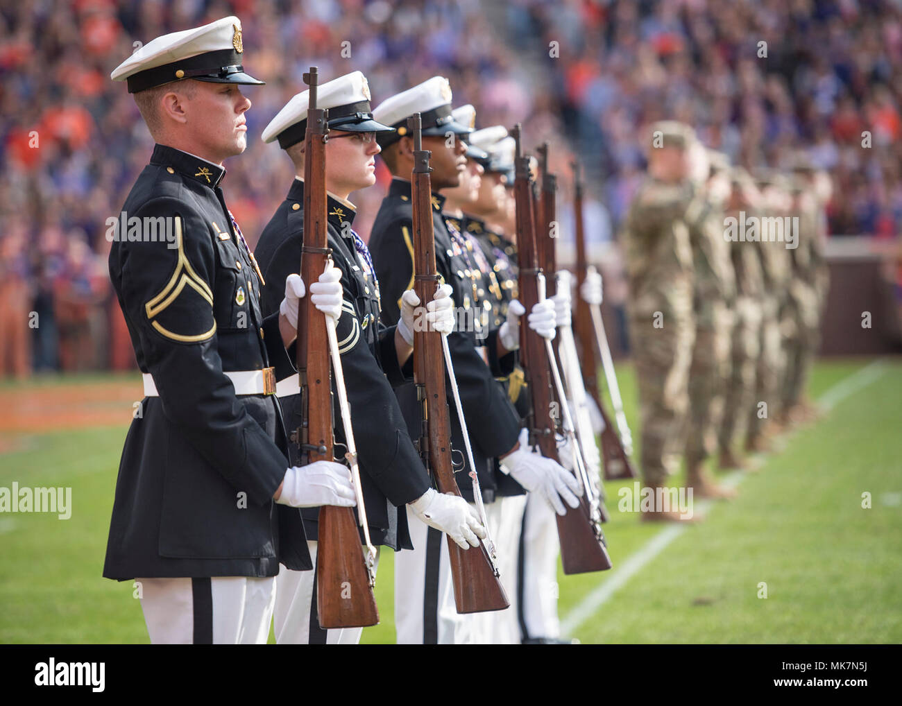The Clemson University Pershing Rifles present arms as a Fallen Soldier ...