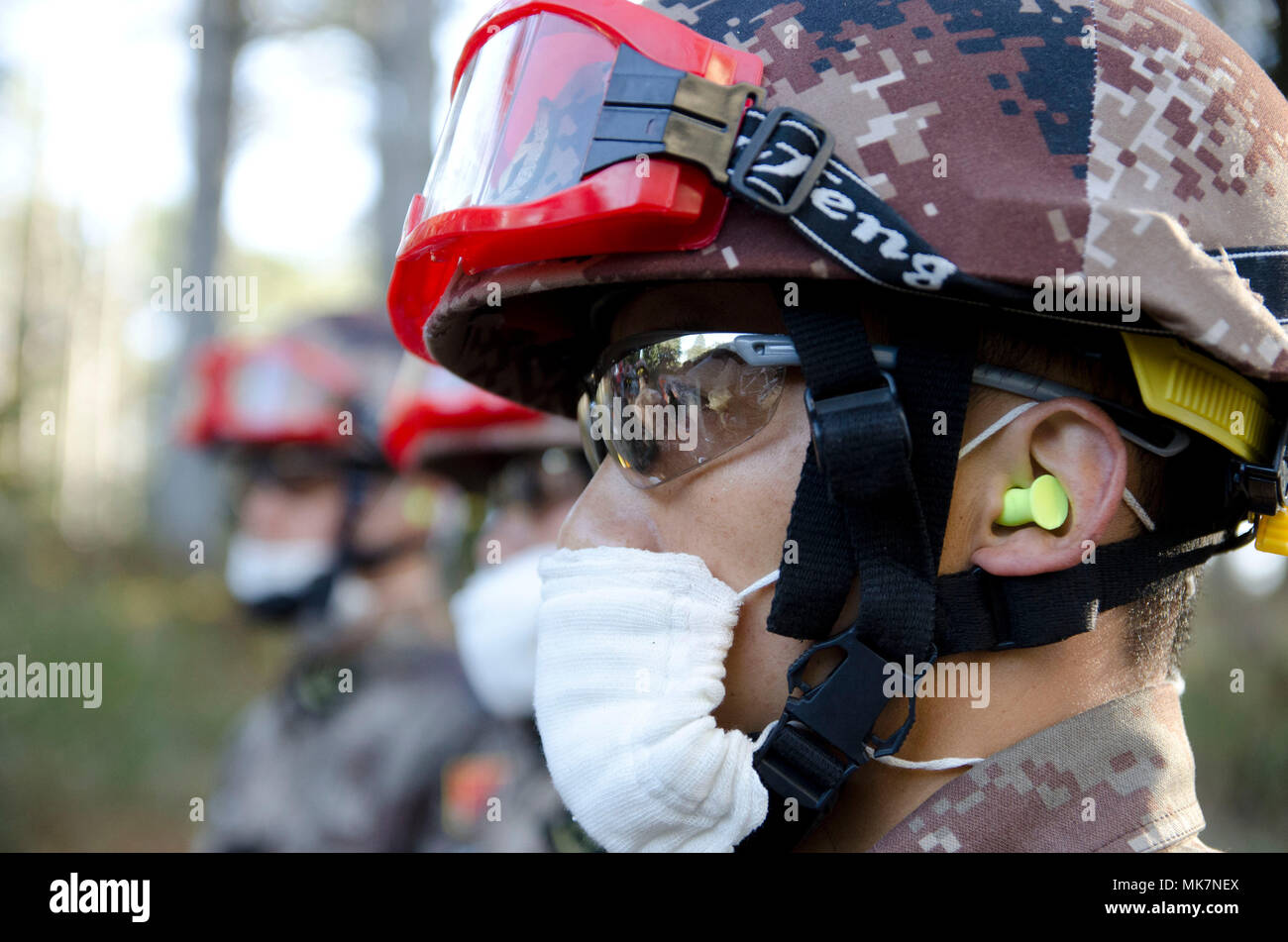 Soldiers from the People’s Liberation Army (PLA) wear masks in ...