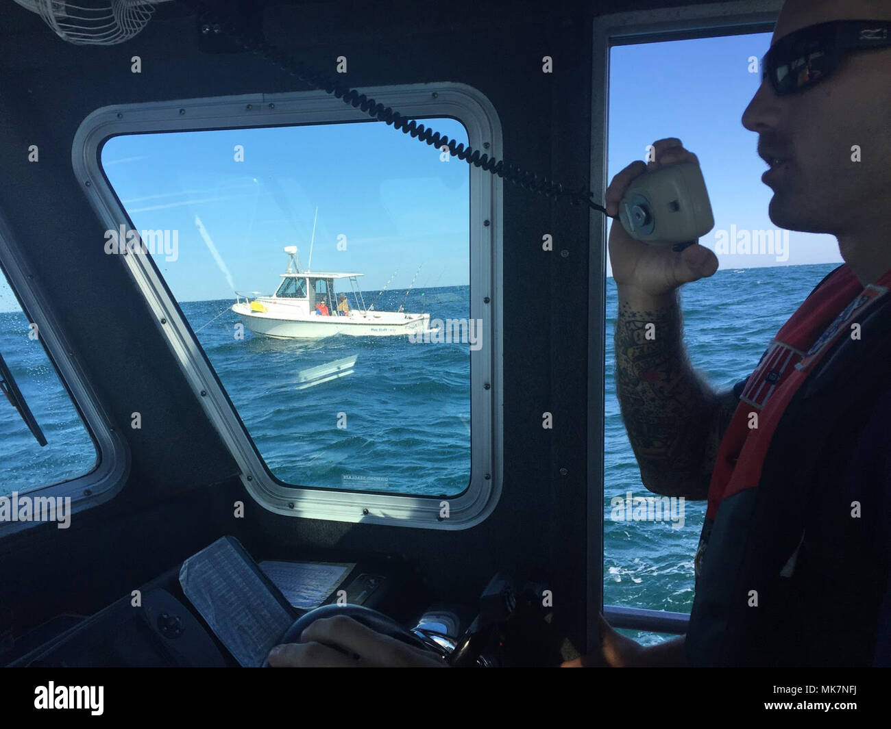 Petty Officer 2nd Class Sean J. Baker, a 27-foot Utility Boat-Medium ...
