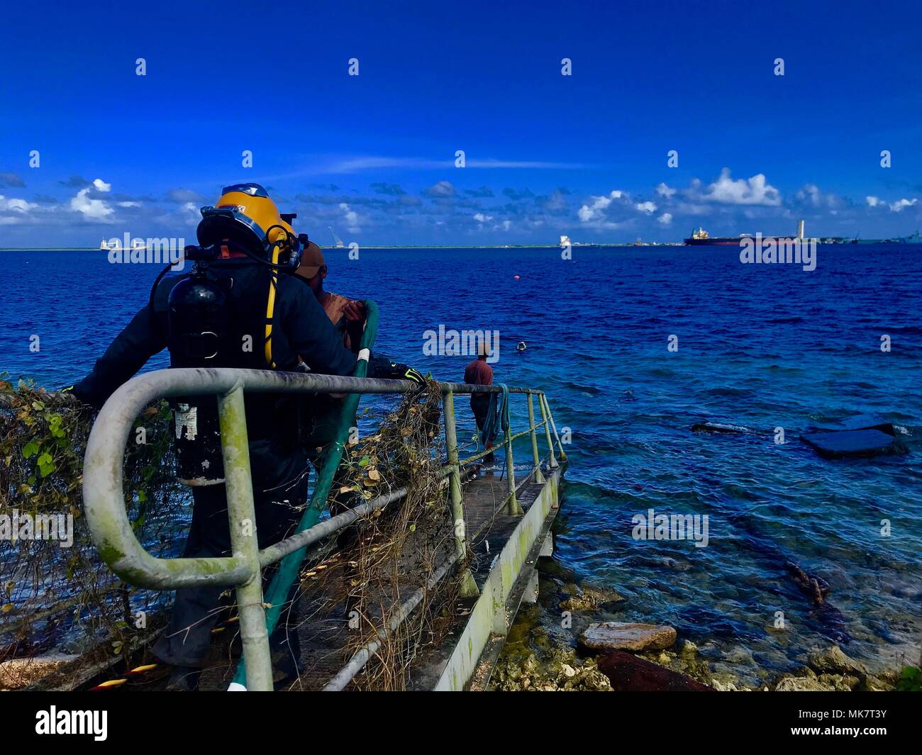 U.S. Navy Builder 2nd Class Kyle Foresman, a Seabee assigned to ...