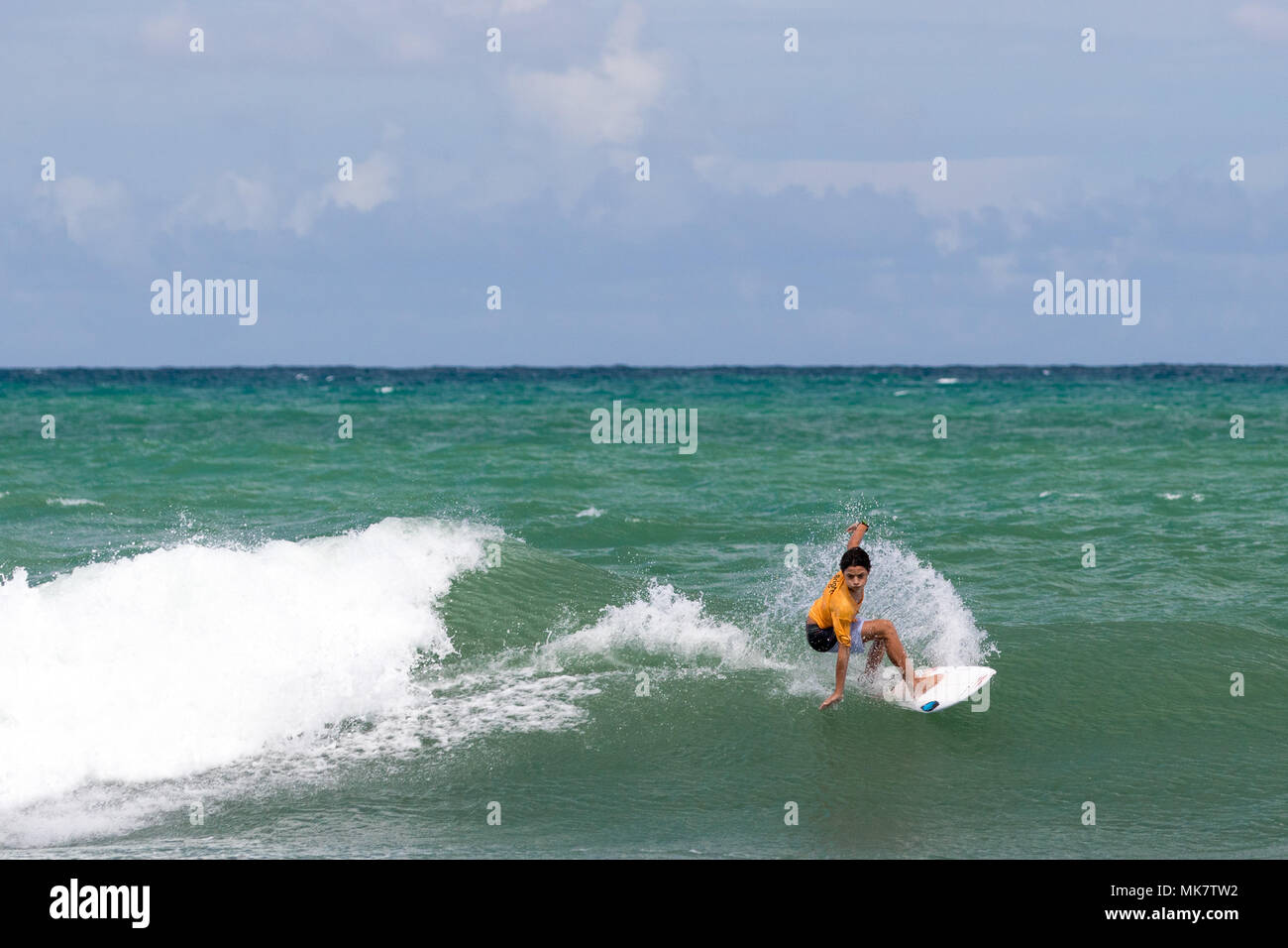 SAN JUAN, Puerto Rico — A local teen takes part in the La Comprita ...
