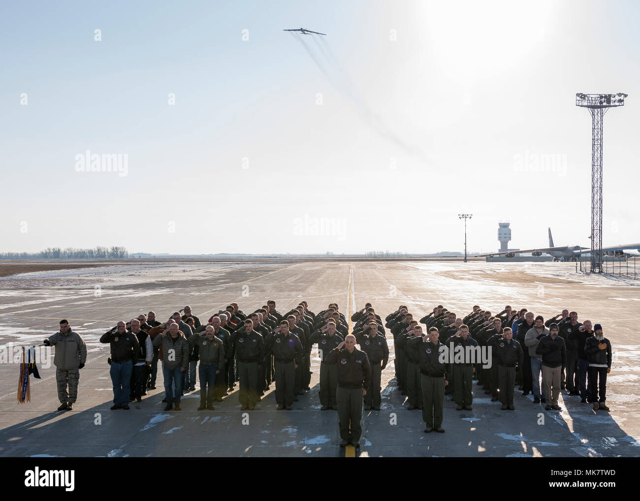 A B-52H Stratofortress flies over 23rd Bomb Squadron Airmen at Minot ...