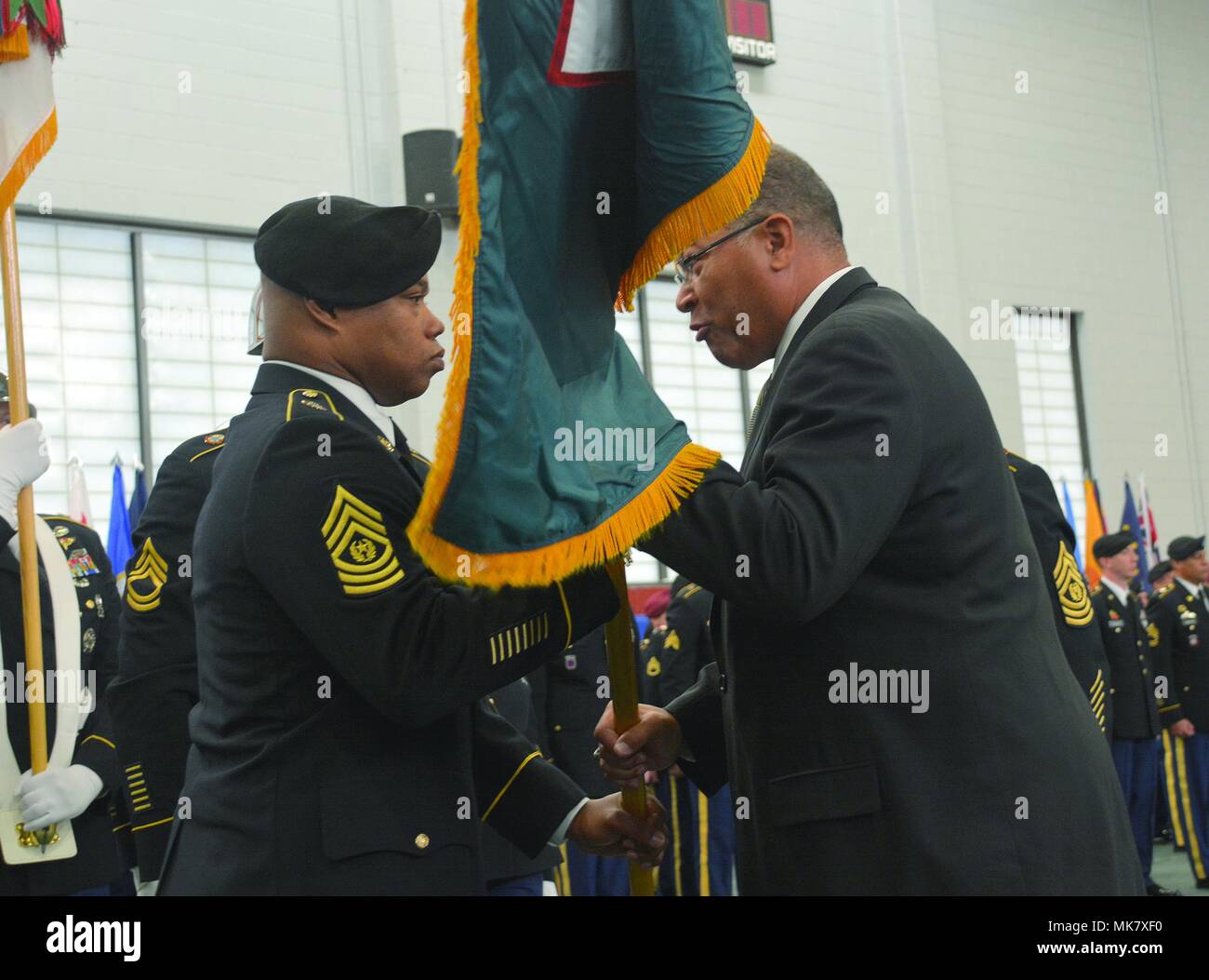 Michael Williams, Army Logistics University president, hands the ...