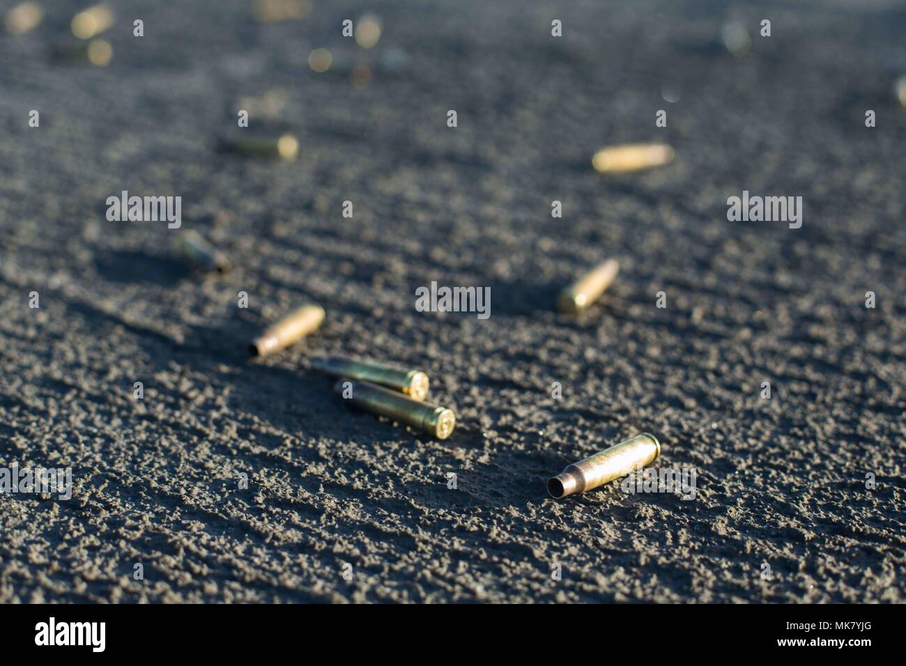 Ammunition casings lay on the flight deck during combat marksmanship ...
