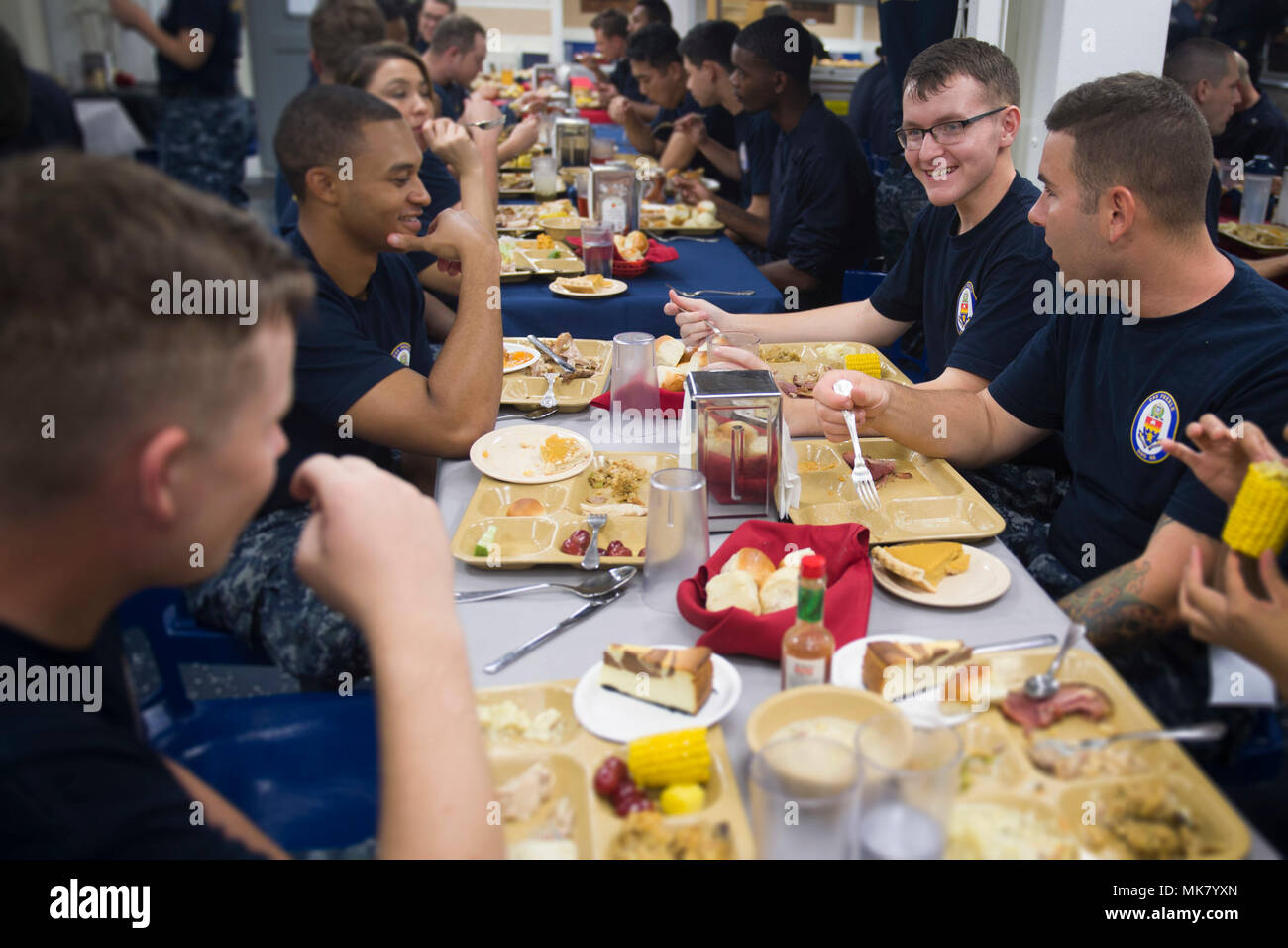 171123-N-IA905-2018 INDIAN OCEAN (Nov. 23, 2017) Sailors gather on the ...