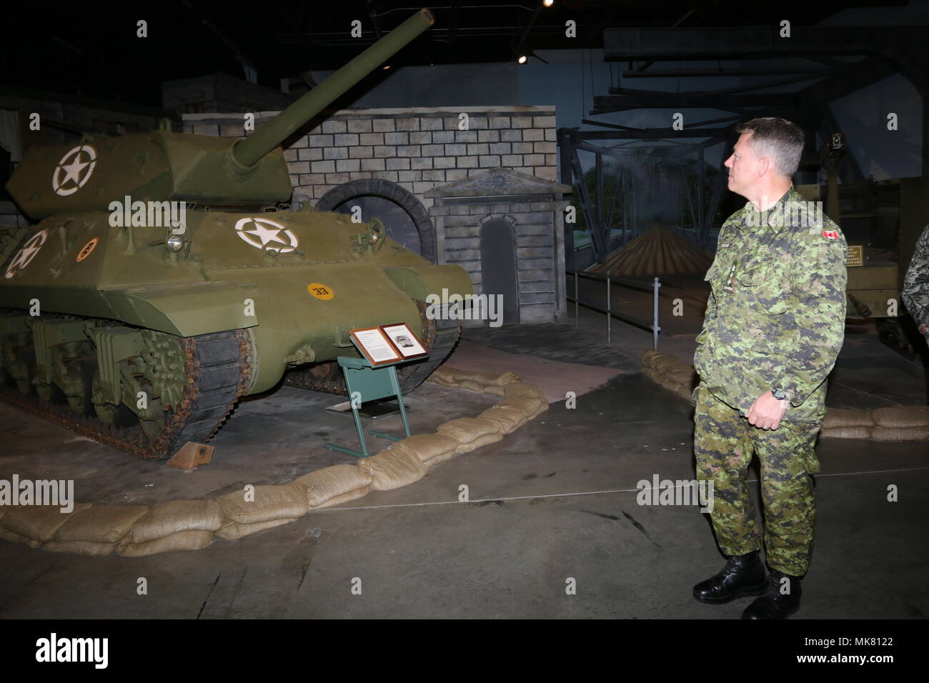 Col. Patrick Henri Robichaud, Canadian Military Attaché, examines the ...