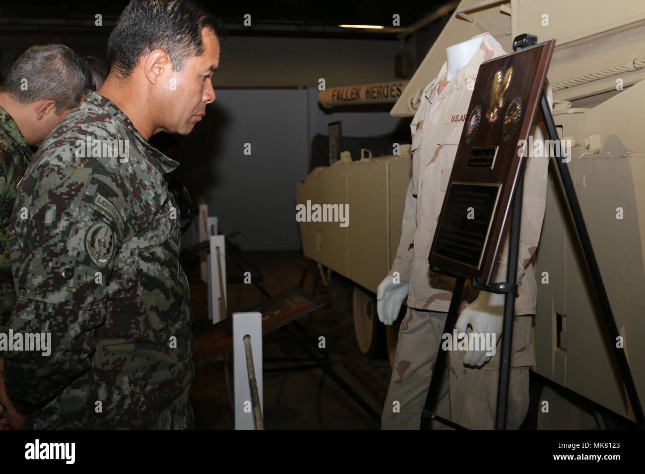 Maj. Gen. Ricardo Ruben Pajares, Peruvian Military Attaché, reads a ...