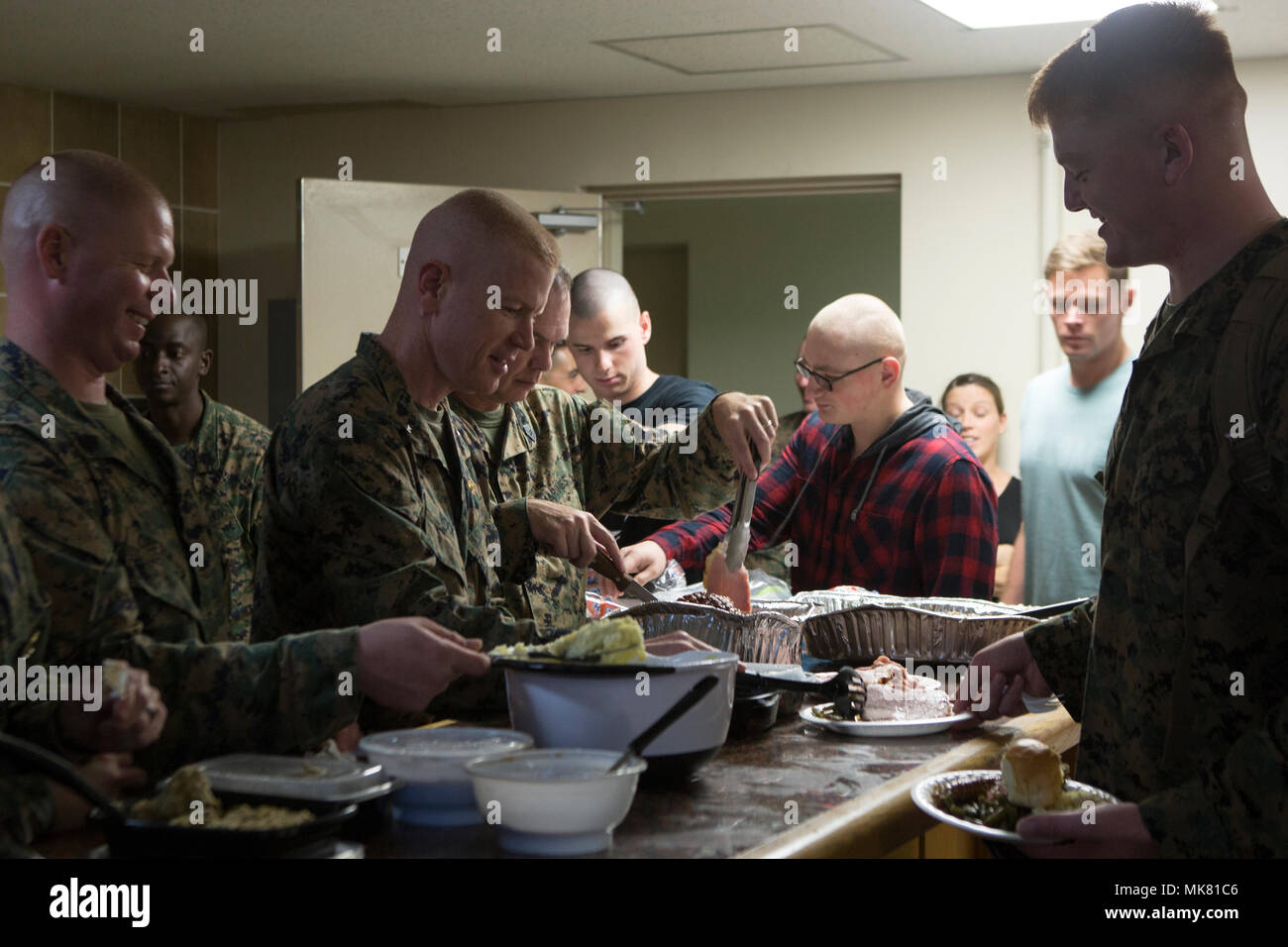 CAMP FOSTER, OKINAWA, Japan – Brig. Gen. Paul Rock Jr. serves Marines ...