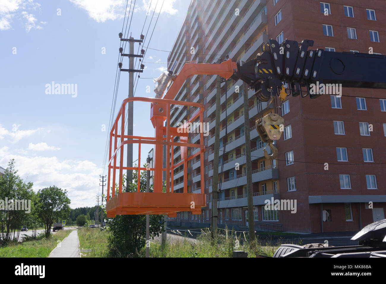 car cradle on a background of construction Stock Photo - Alamy