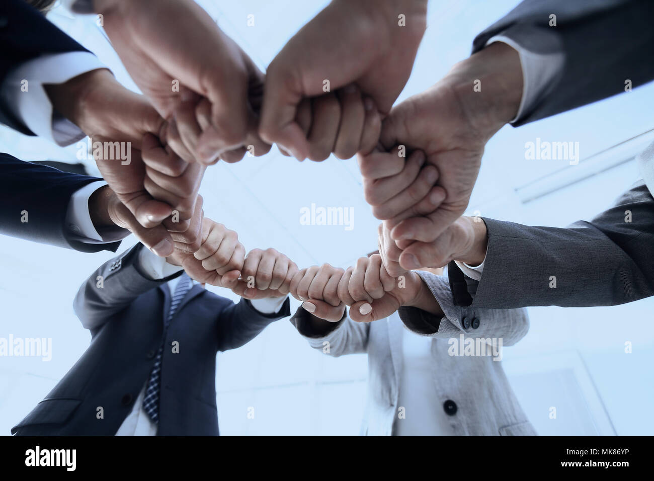 group of people joined their hands Stock Photo - Alamy