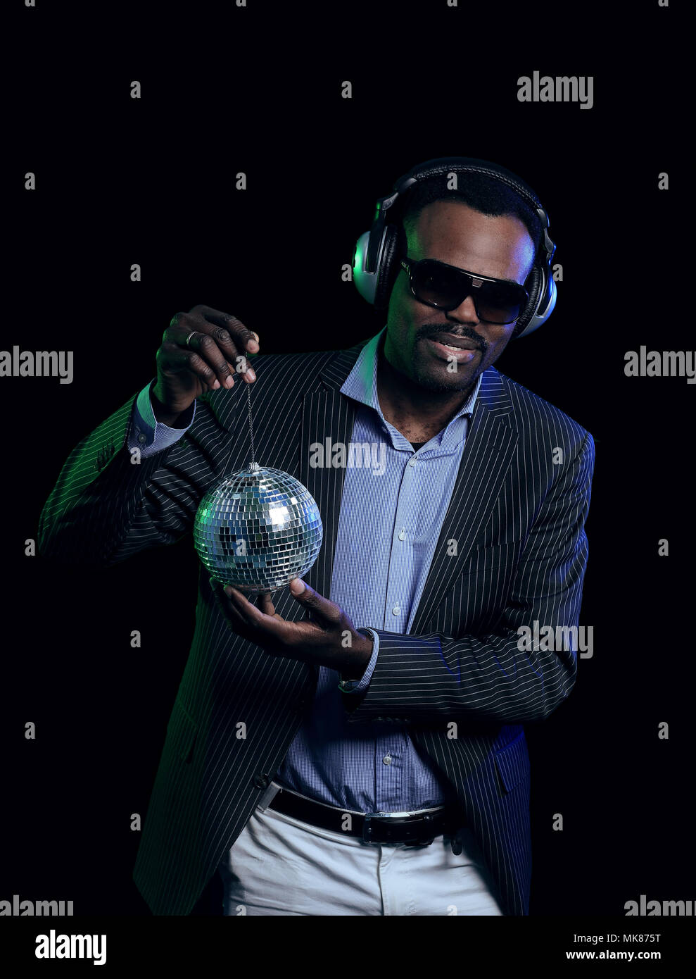 African American man Disco Ball Over Black Background Stock Photo - Alamy