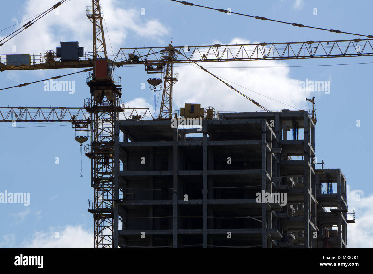 Construction Site silhouettes work labor derrick concrete Stock Photo ...