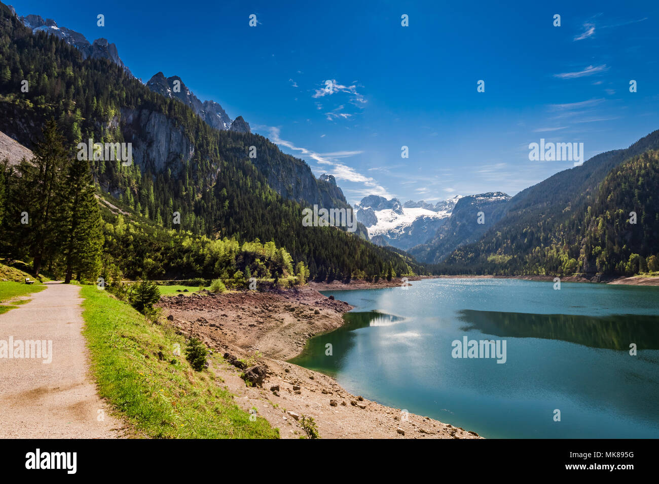 Sunny sunrise at Gosausee lake in spring, Alps, Austria Stock Photo - Alamy