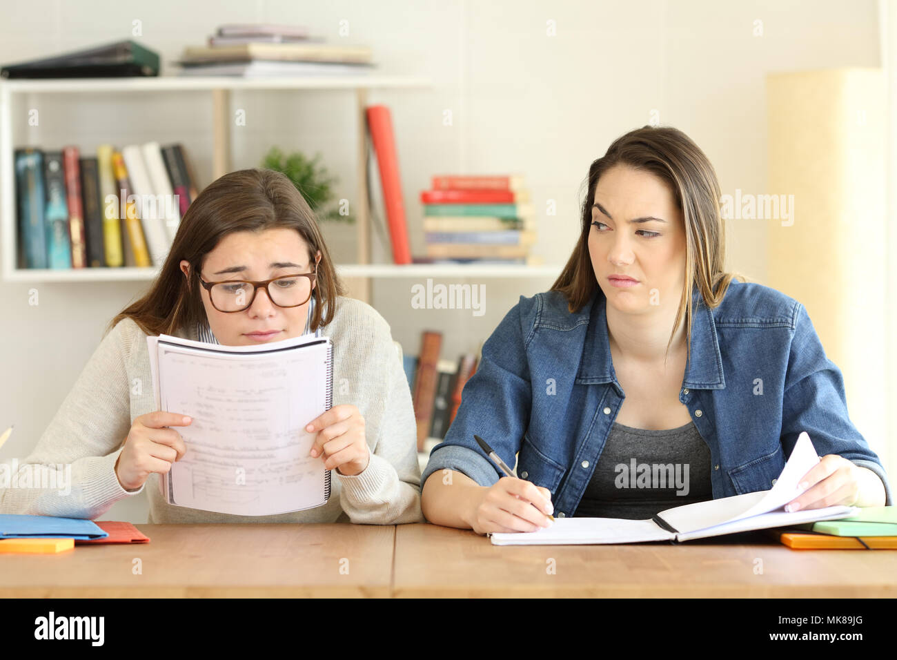 Student having eyesight problems and another one despising her while ...