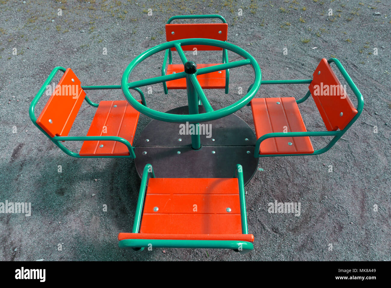 Merry go round isolated on white background Stock Photo - Alamy