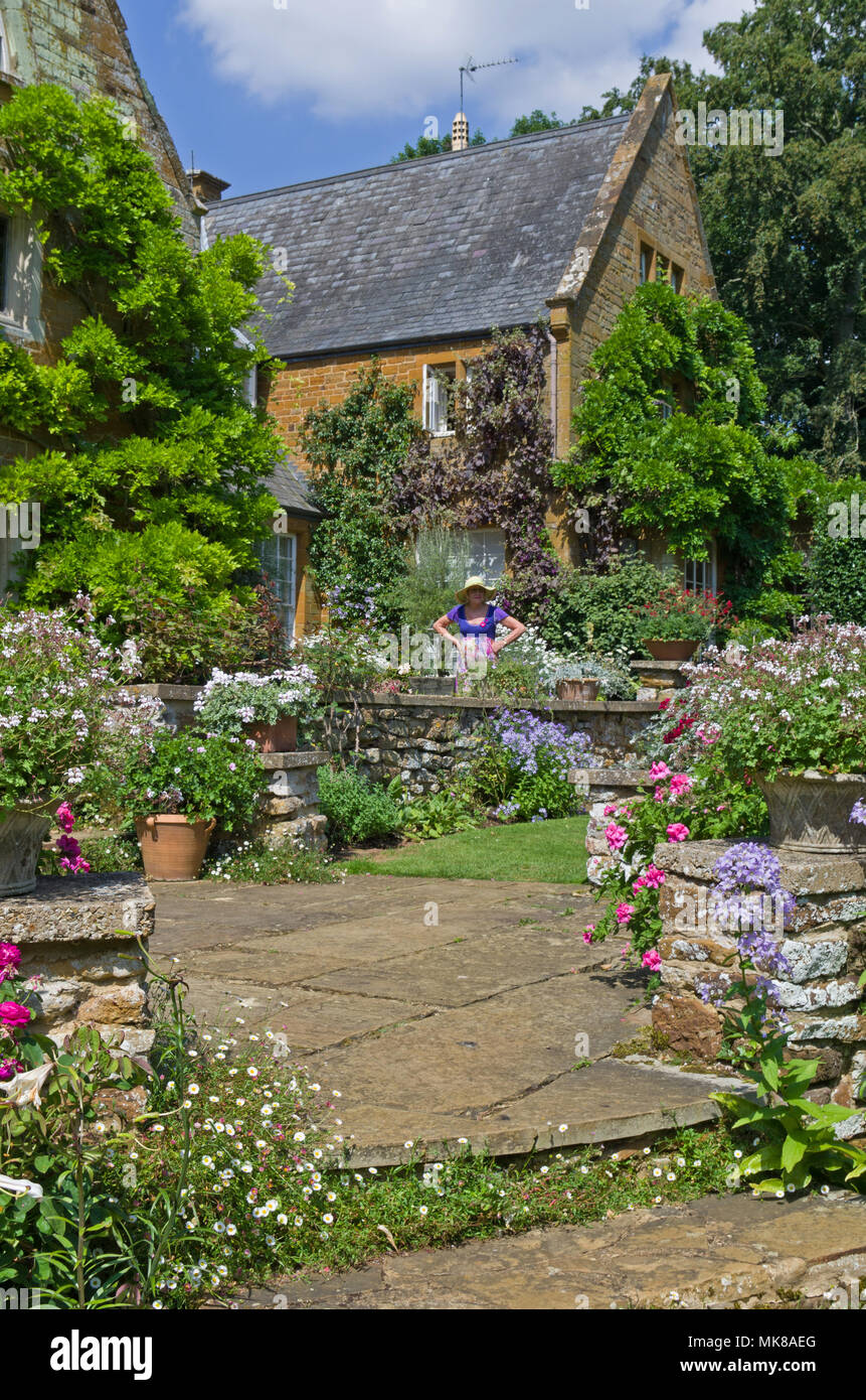 Coton Manor, a 17th century manor house, surrounded by landscaped ... Coton Manor, a 17th century manor house, surrounded by landscaped ...