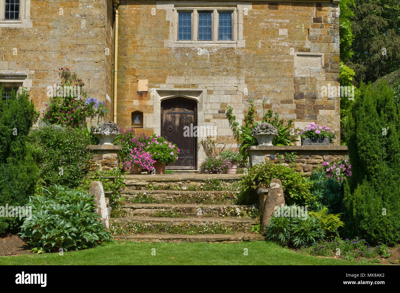 Coton Manor, a 17th century manor house, surrounded by landscaped ...