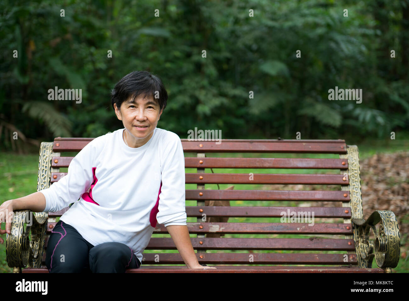 Portrait relaxed asian female retiree hi-res stock photography and ...