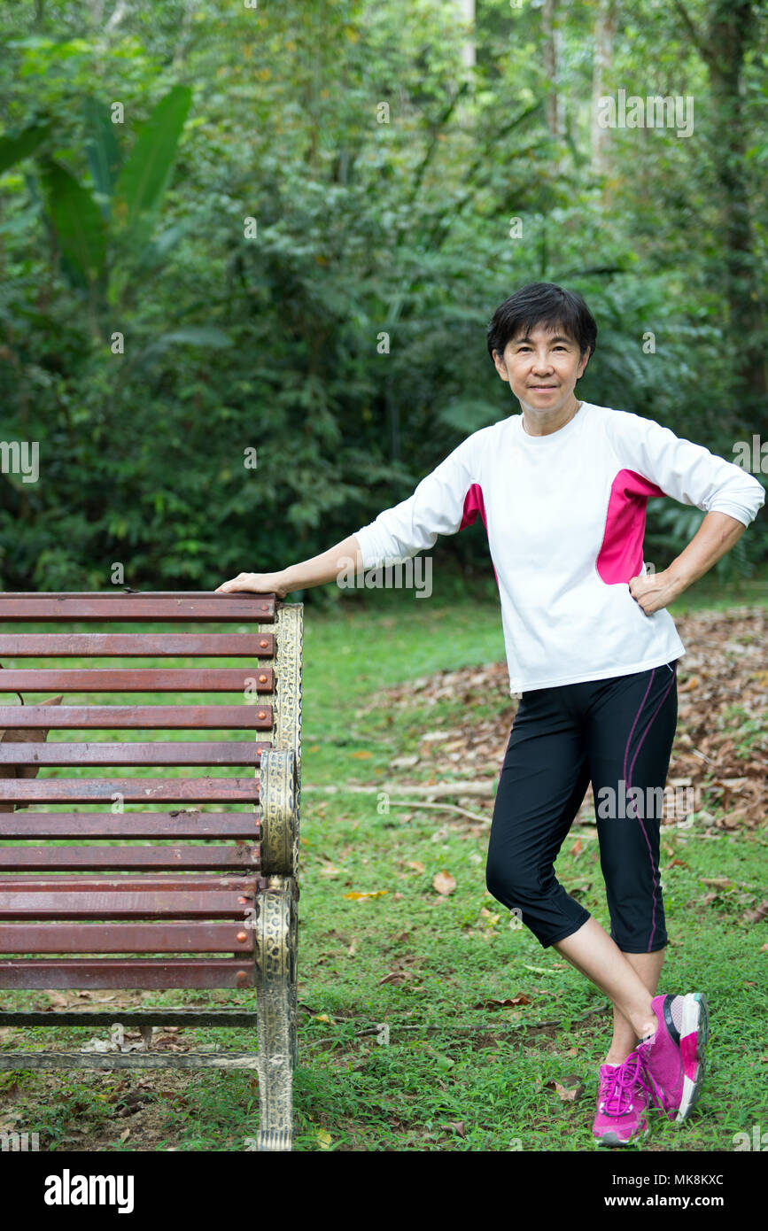 Standing senior chinese woman hi-res stock photography and images - Alamy