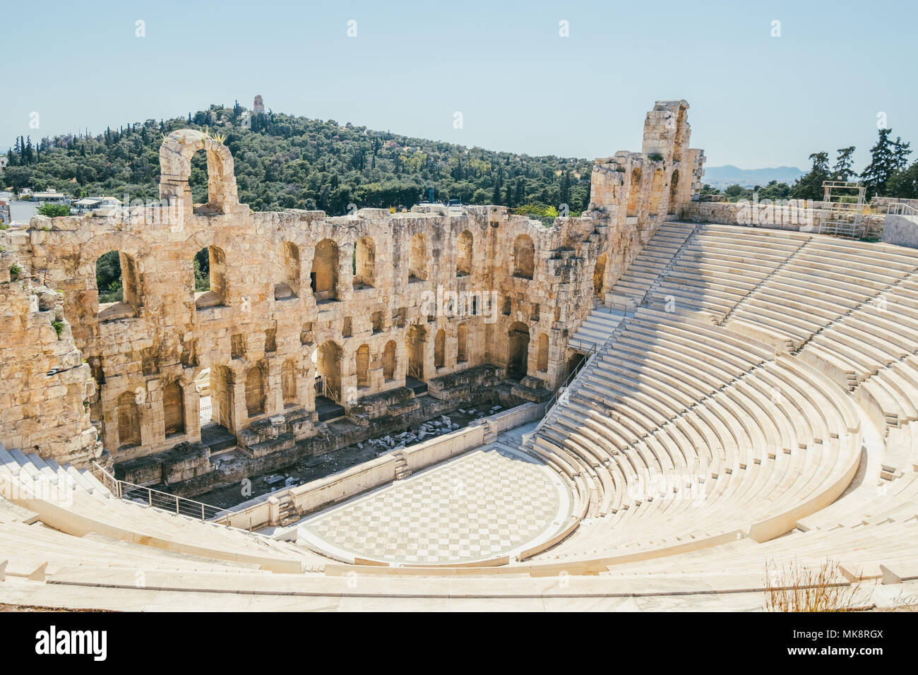 Odeon of Herodes Atticus. A stone theatre structure located on the ...