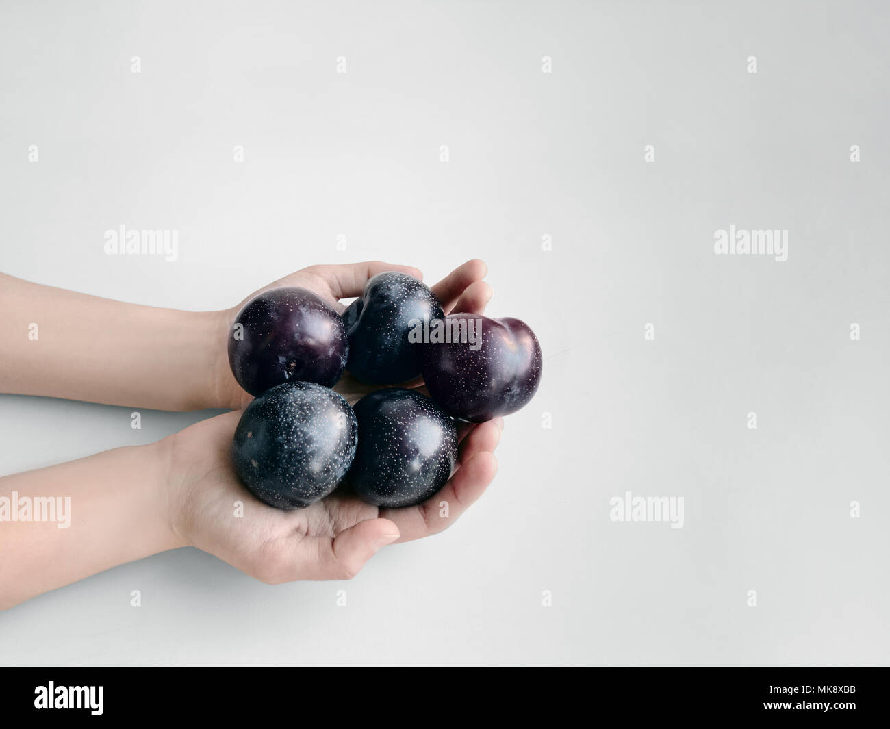 Fresh plums photo Stock Photo - Alamy