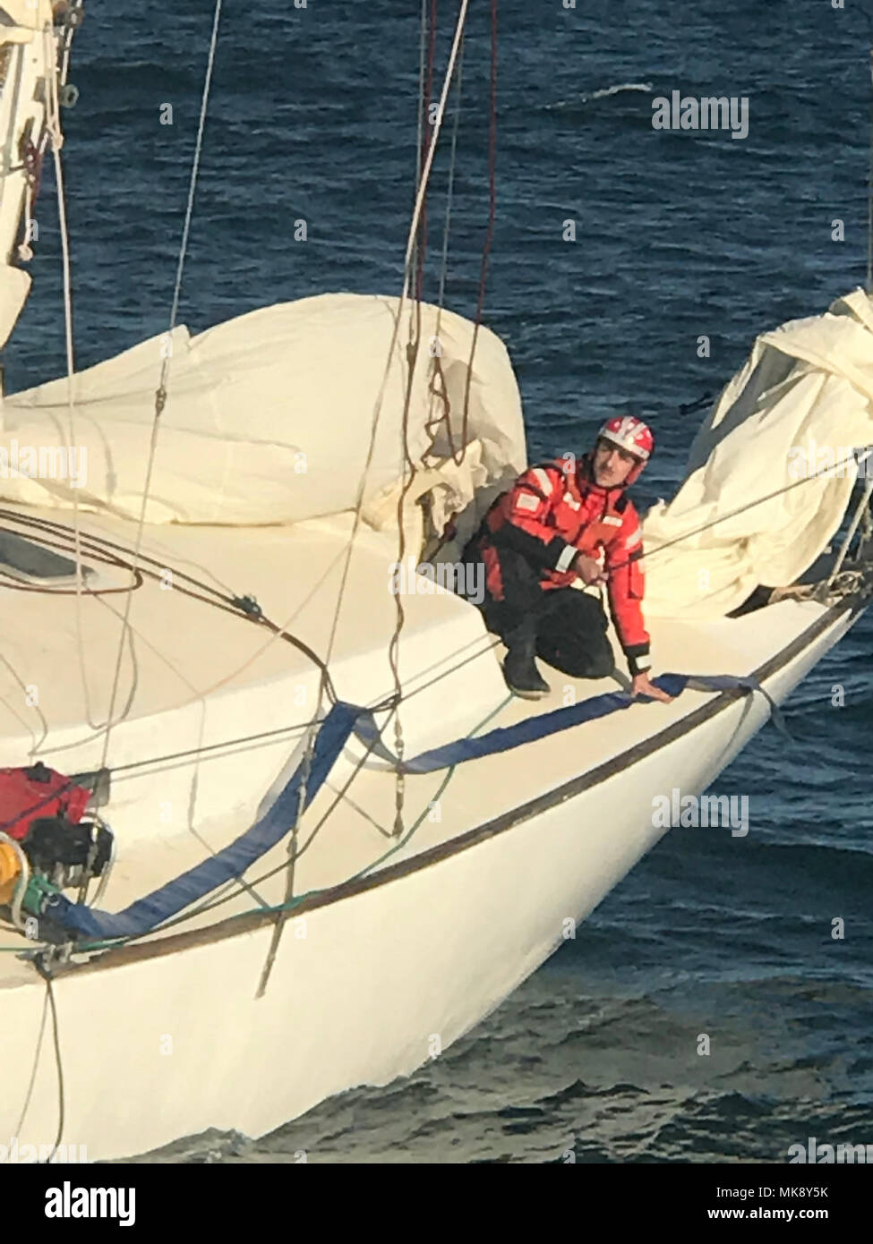Coast Guard Fireman Mike Macchia, a crew member at Coast Guard Station ...