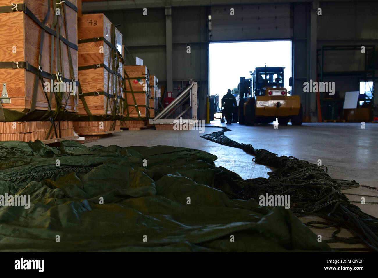 Royal Canadian Air Force Airmen load pallets onto a K-loader Nov. 6 ...