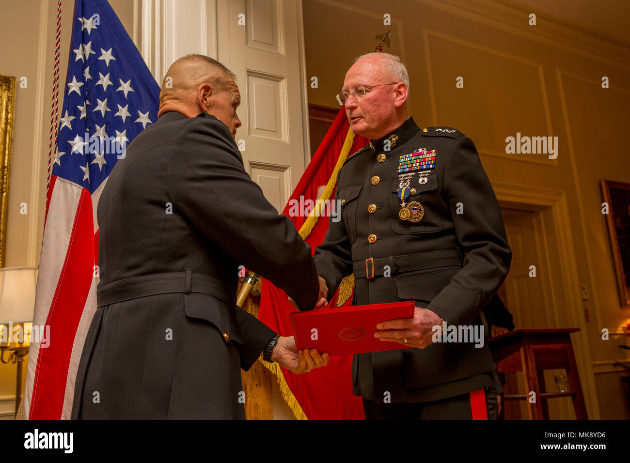 Commandant of the Marine Corps Gen. Robert B. Neller shakes hands with ...