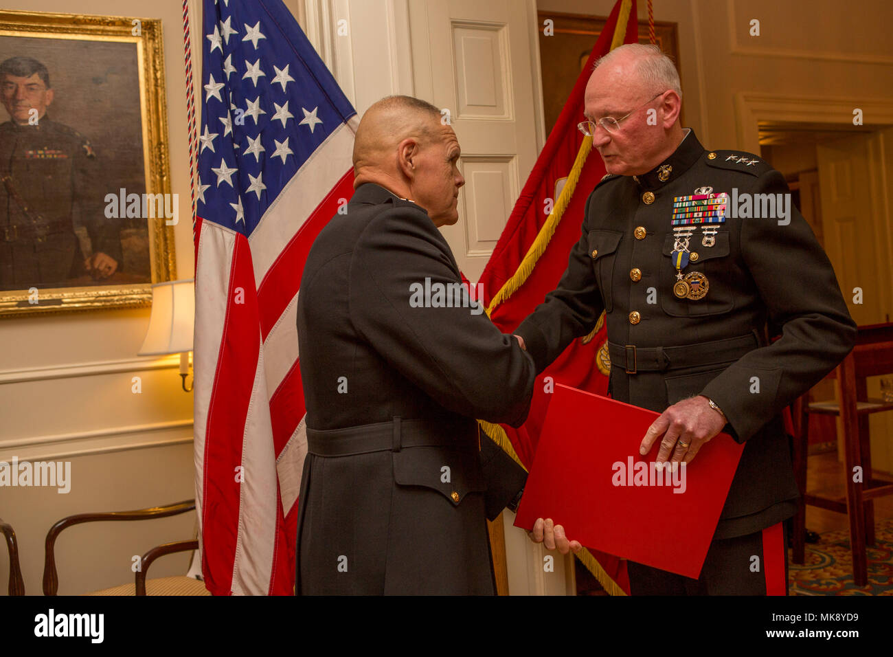 Commandant of the Marine Corps Gen. Robert B. Neller shakes hands with ...