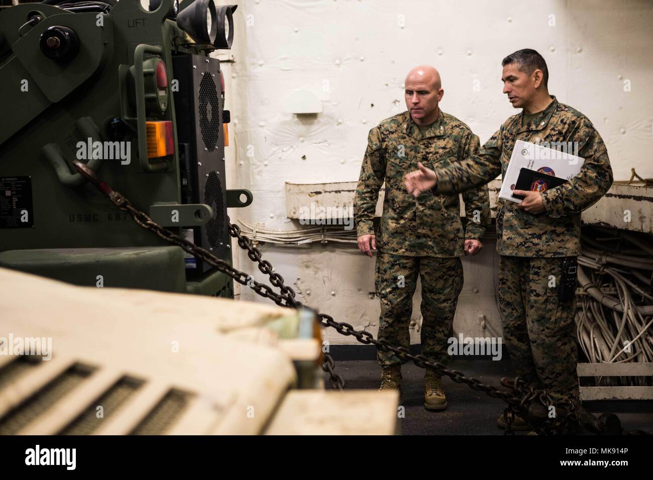 U.S. Marine Corps Col. Farrell J. Sullivan, left, commanding officer of ...