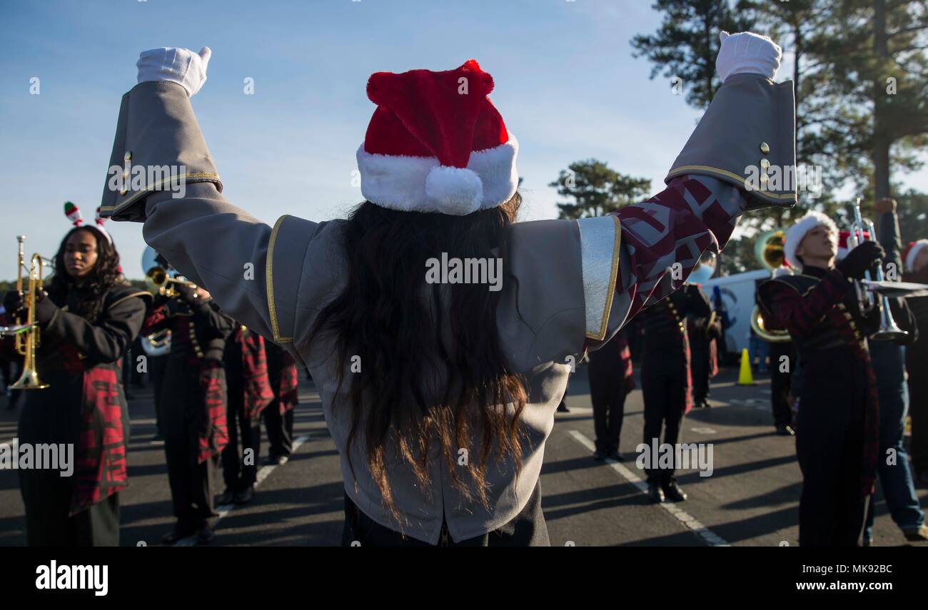 Eliani Sanchez, drum major for Dixon High School directs the band ...